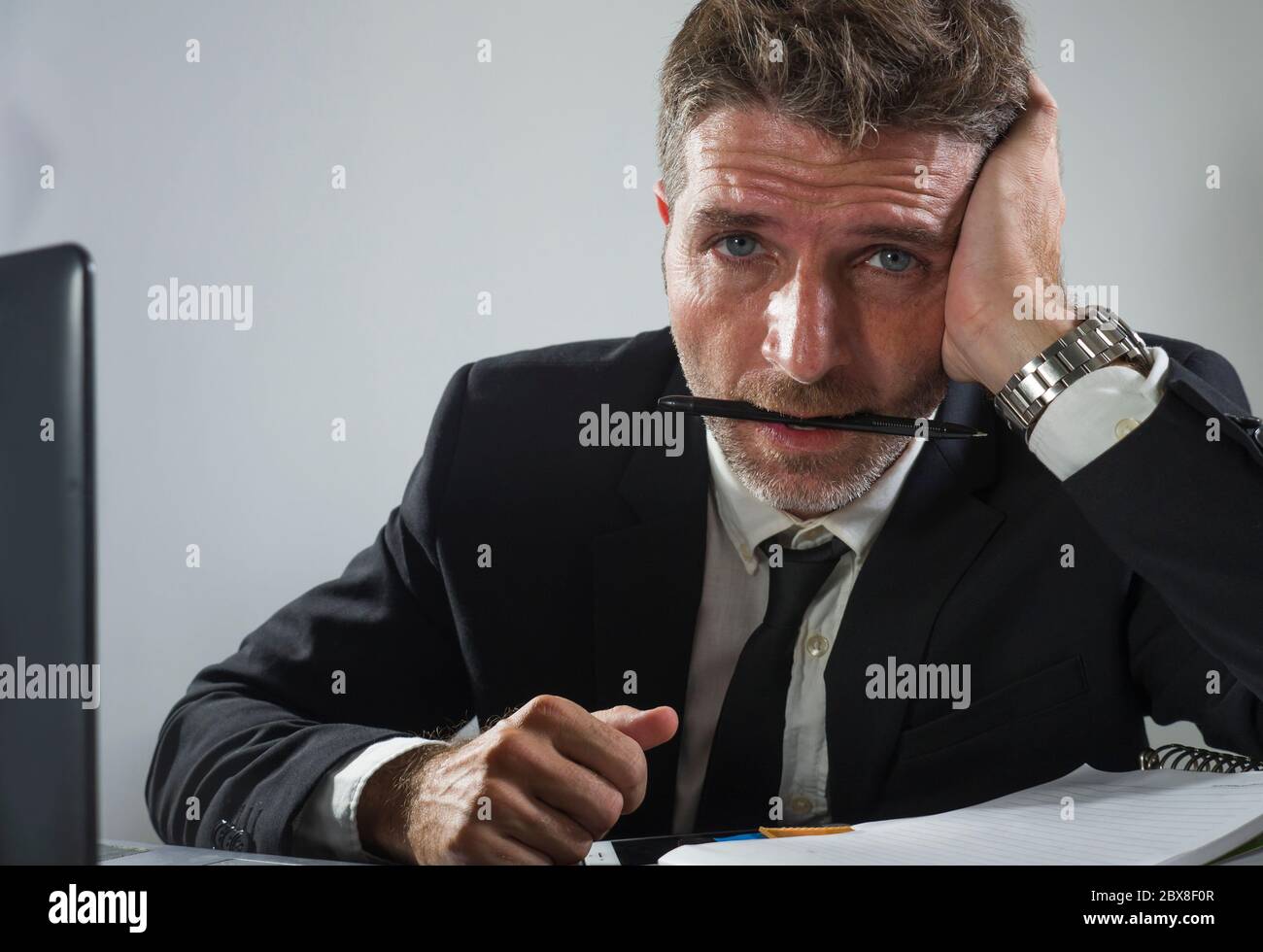 corporate business work stress - young desperate and frustrated ...