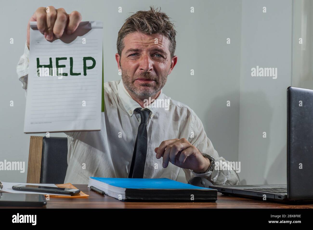 Man crying desk hi-res stock photography and images - Alamy