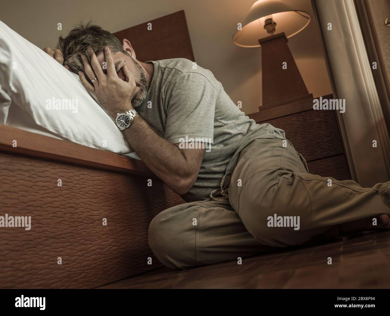 Crying Man On Bed High Resolution Stock Photography and Images - Alamy