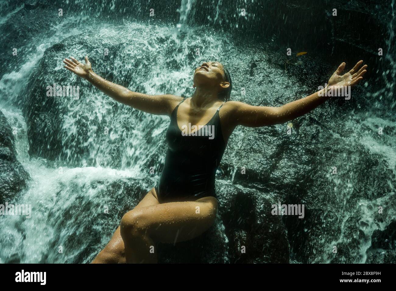 young attractive and blissful Asian Indonesian woman overwhelmed by the ...