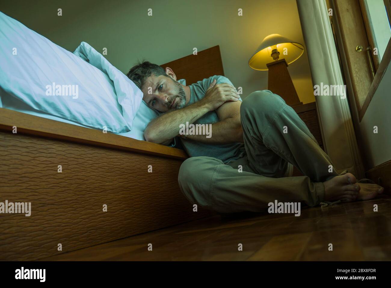 Crying Man On Bed High Resolution Stock Photography and Images - Alamy