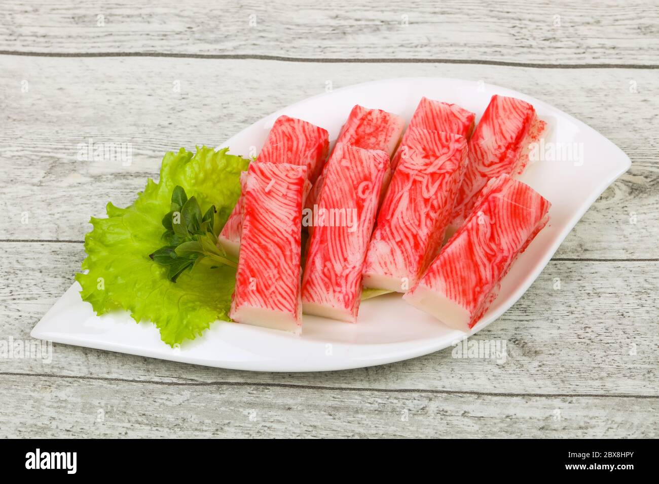 Crab surimi stick served salad leaves Stock Photo - Alamy