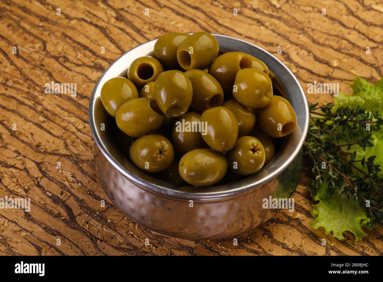 Big green olives in the bowl Stock Photo - Alamy