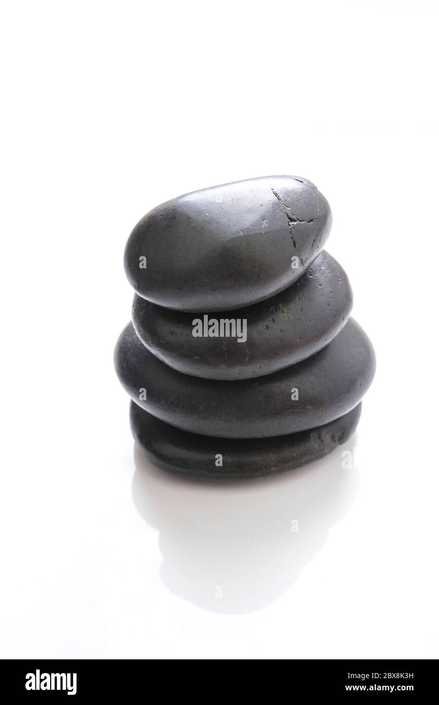 Stacked black rocks Stock Photo - Alamy