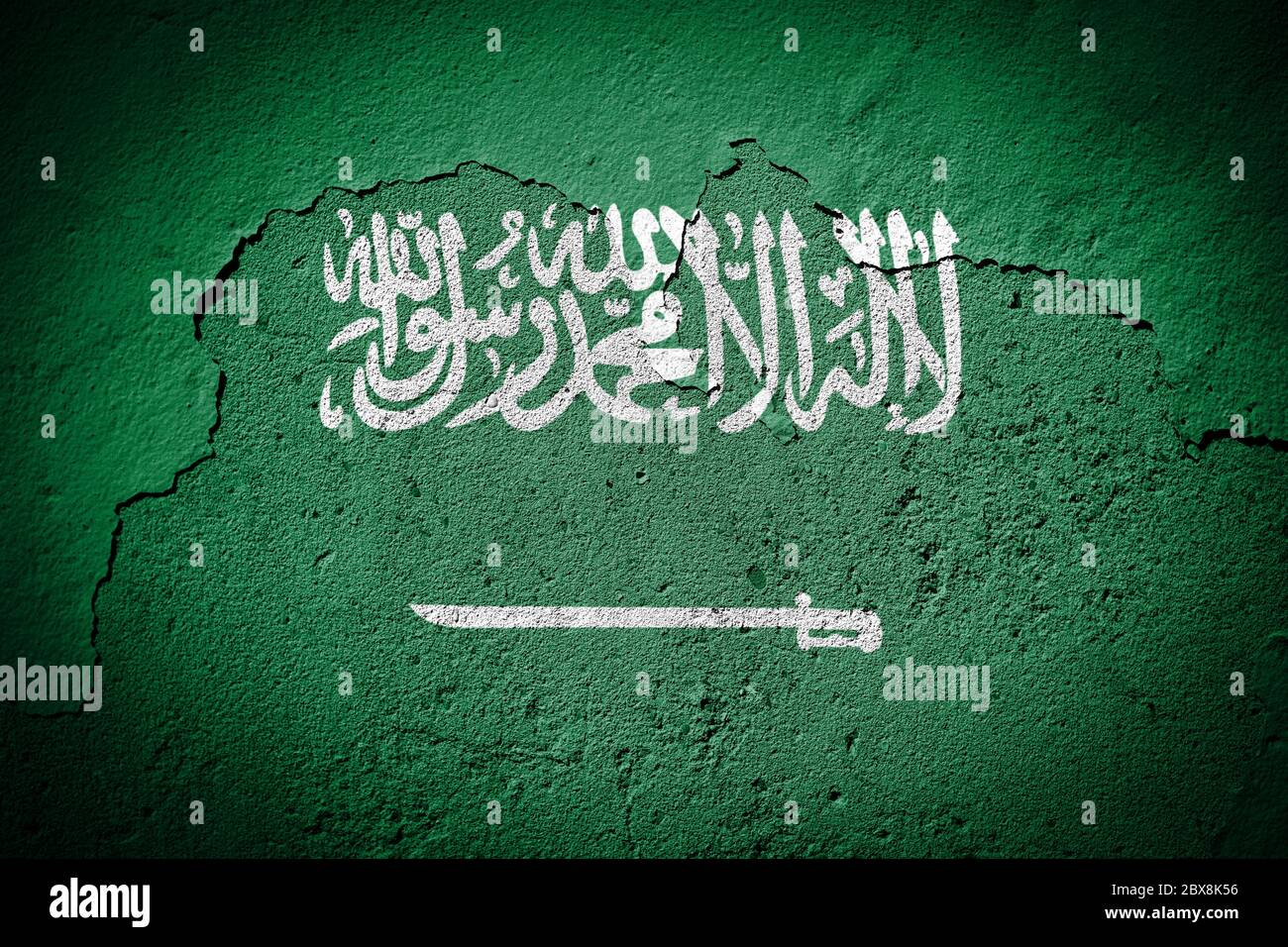 Saudi Arabia flag painted on grungy cracked wall Stock Photo - Alamy