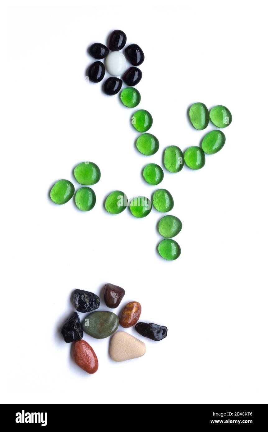 A flower made from sea glass stones, on white background Stock Photo ...