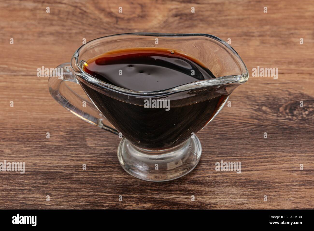 Asian cuisine - soya sauce in the bowl Stock Photo - Alamy