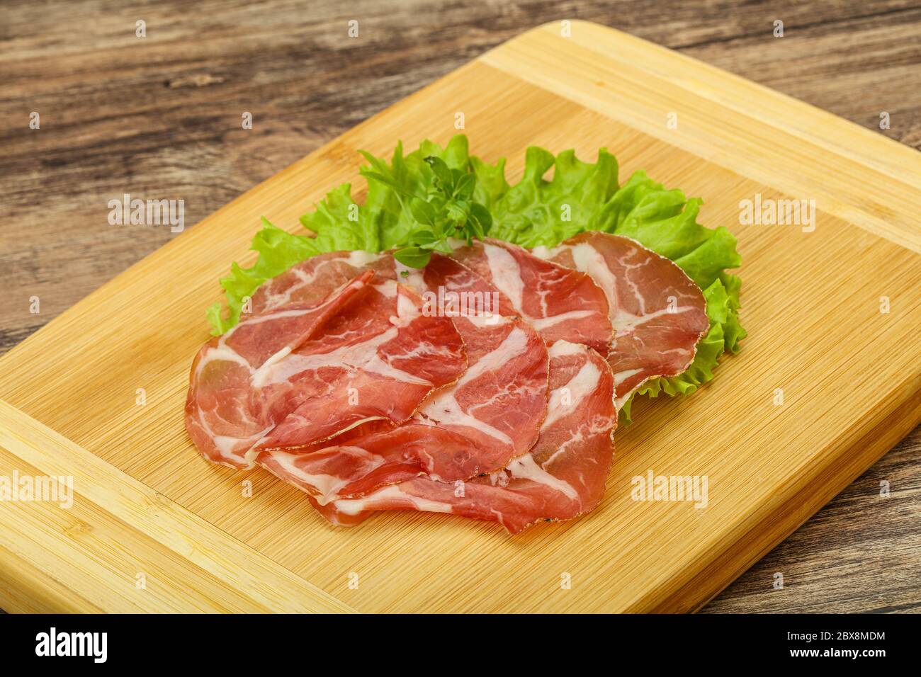 Delicous Smoked pork neck slices snack Stock Photo - Alamy