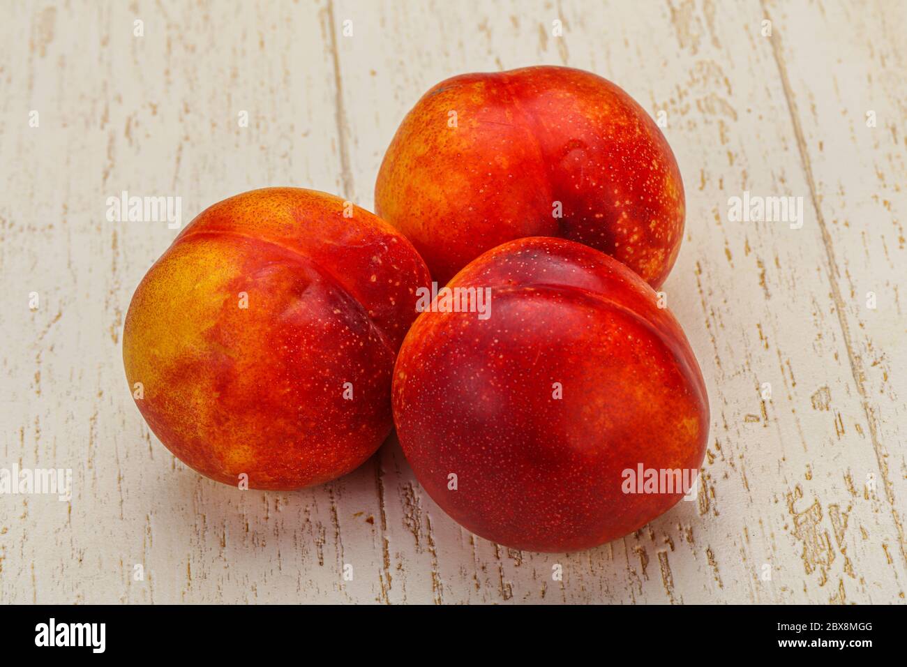 Ripe sweet tasty red Nectarine fruit Stock Photo - Alamy