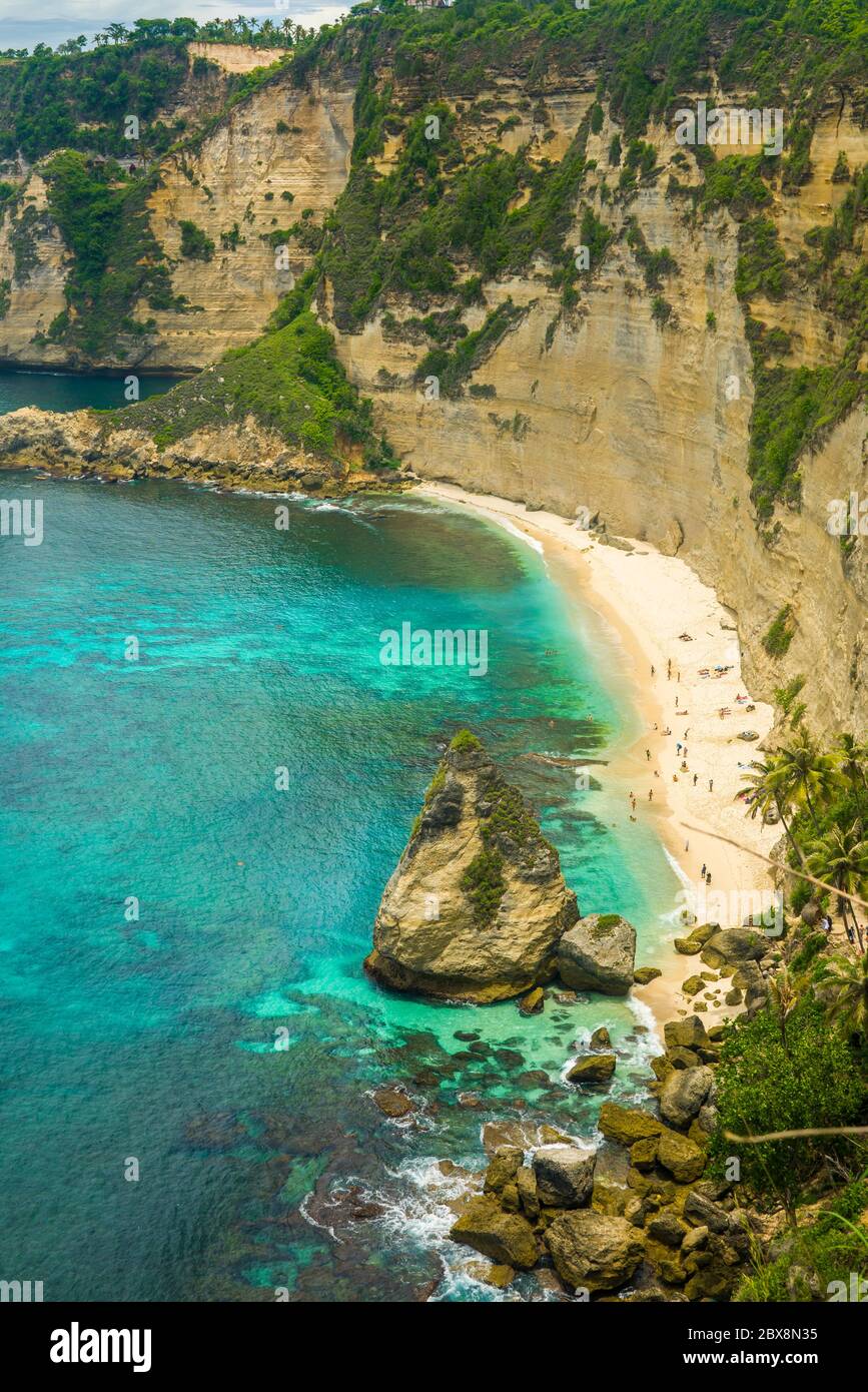 beautiful aerial view of tropical paradise beach and rock cliff with ...