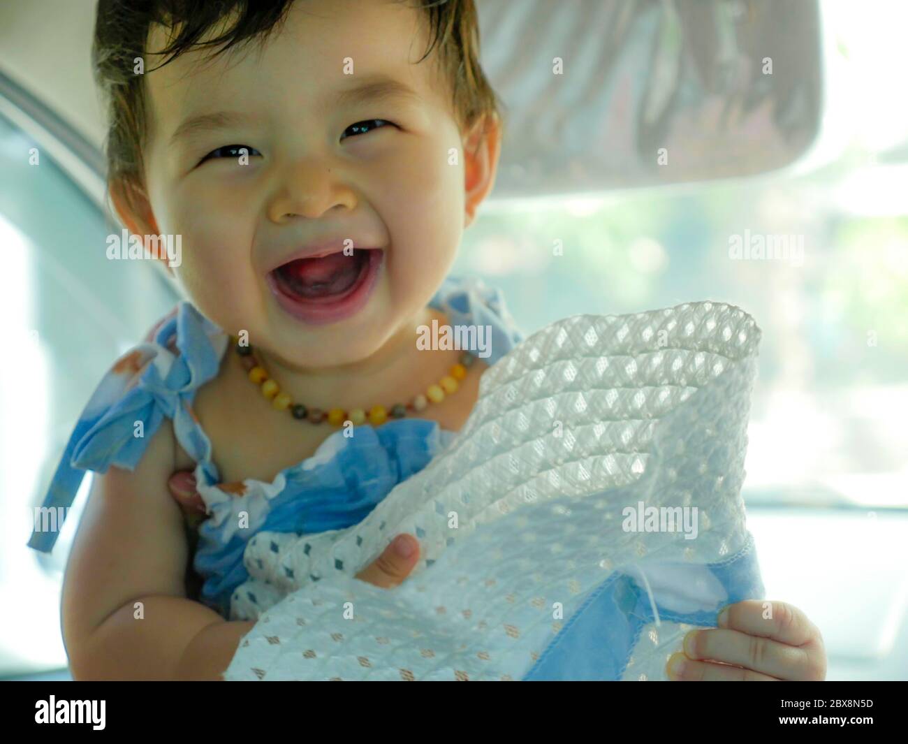 Laughing Asian Baby