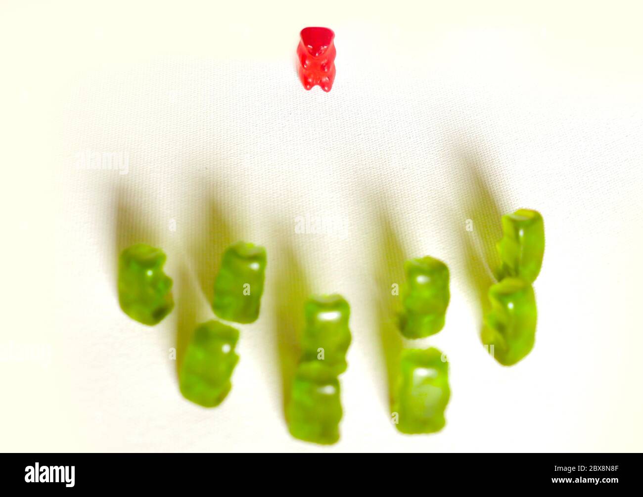 sweet candy gummy teddy bears representing group of students or work ...