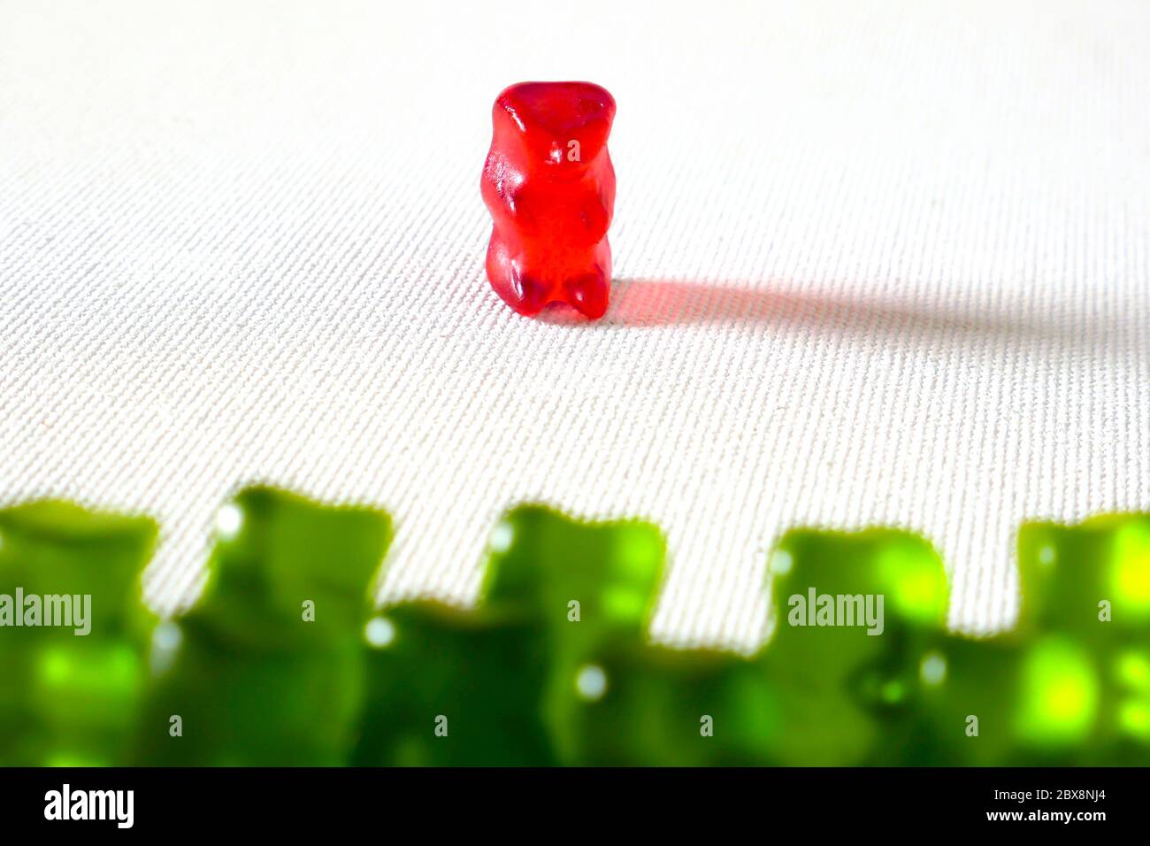 sweet candy gummy teddy bears representing group of students or work ...