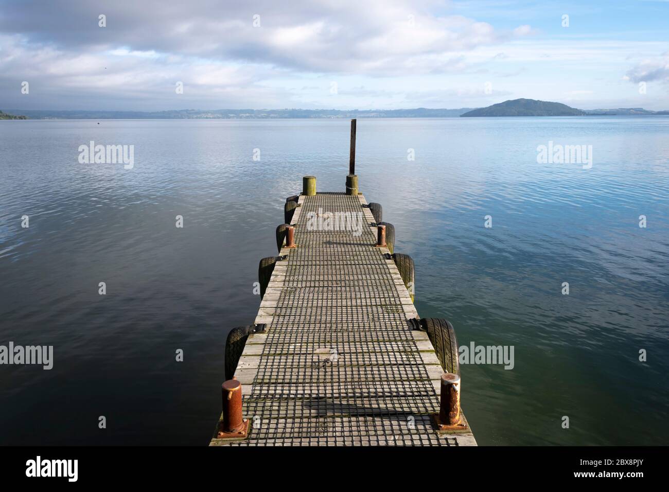 Small jetty at Lake Rotorua and Mokoia Island, Rotorua, North island ...