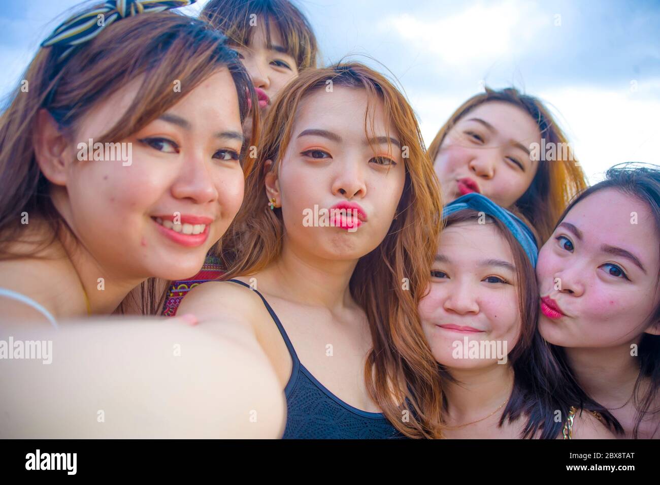 Lifestyle Beach Portrait Of Asian Korean And Chinese Women Group Of