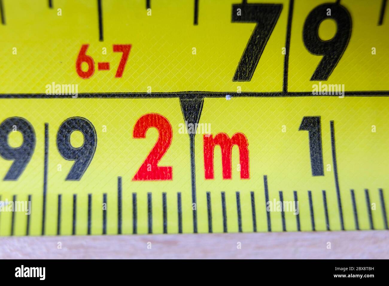 Detail of a tape measure at the 2 Metre mark Stock Photo - Alamy