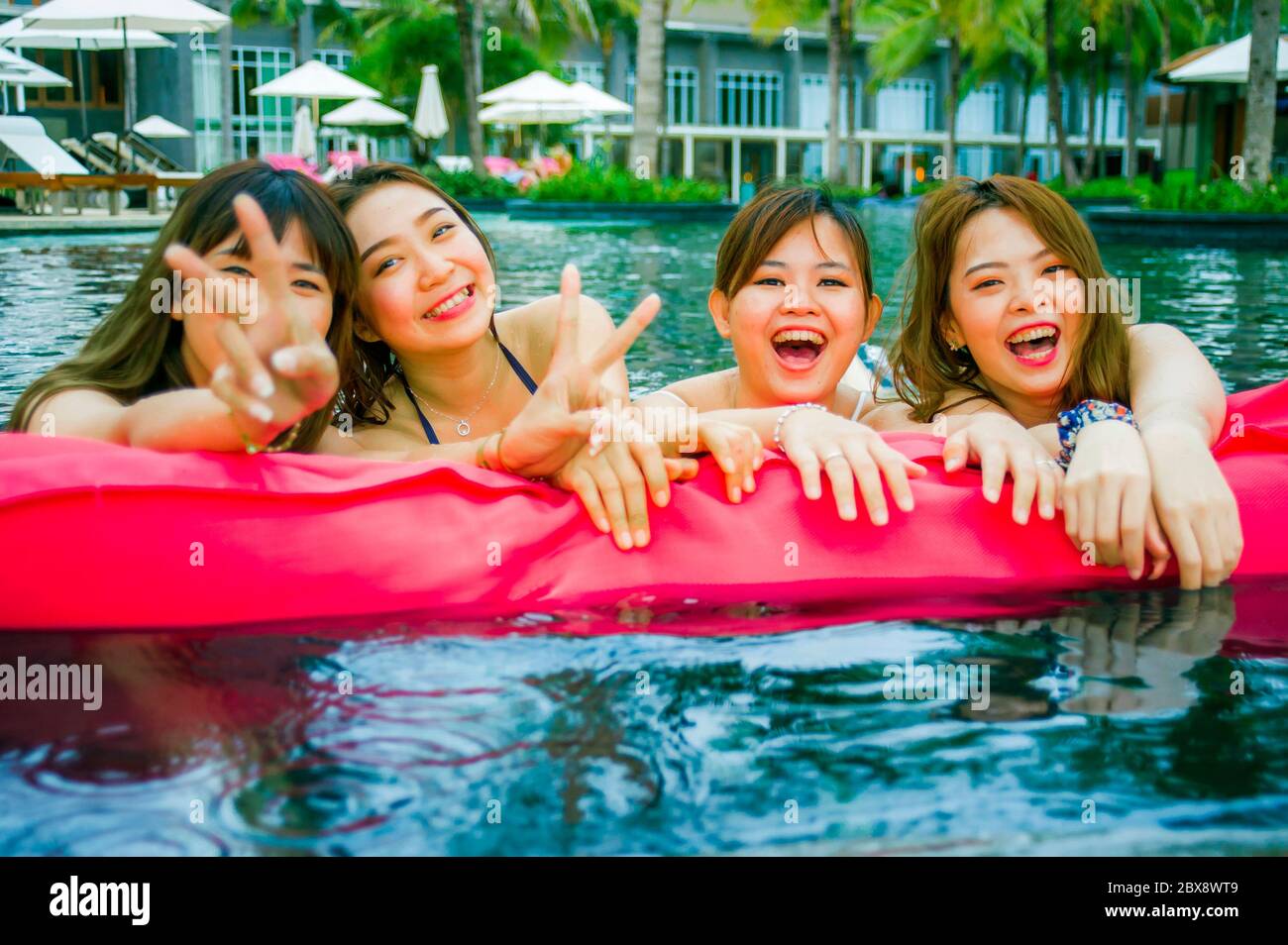 lifestyle portrait of young Asian Chinese and Korean women group of ...