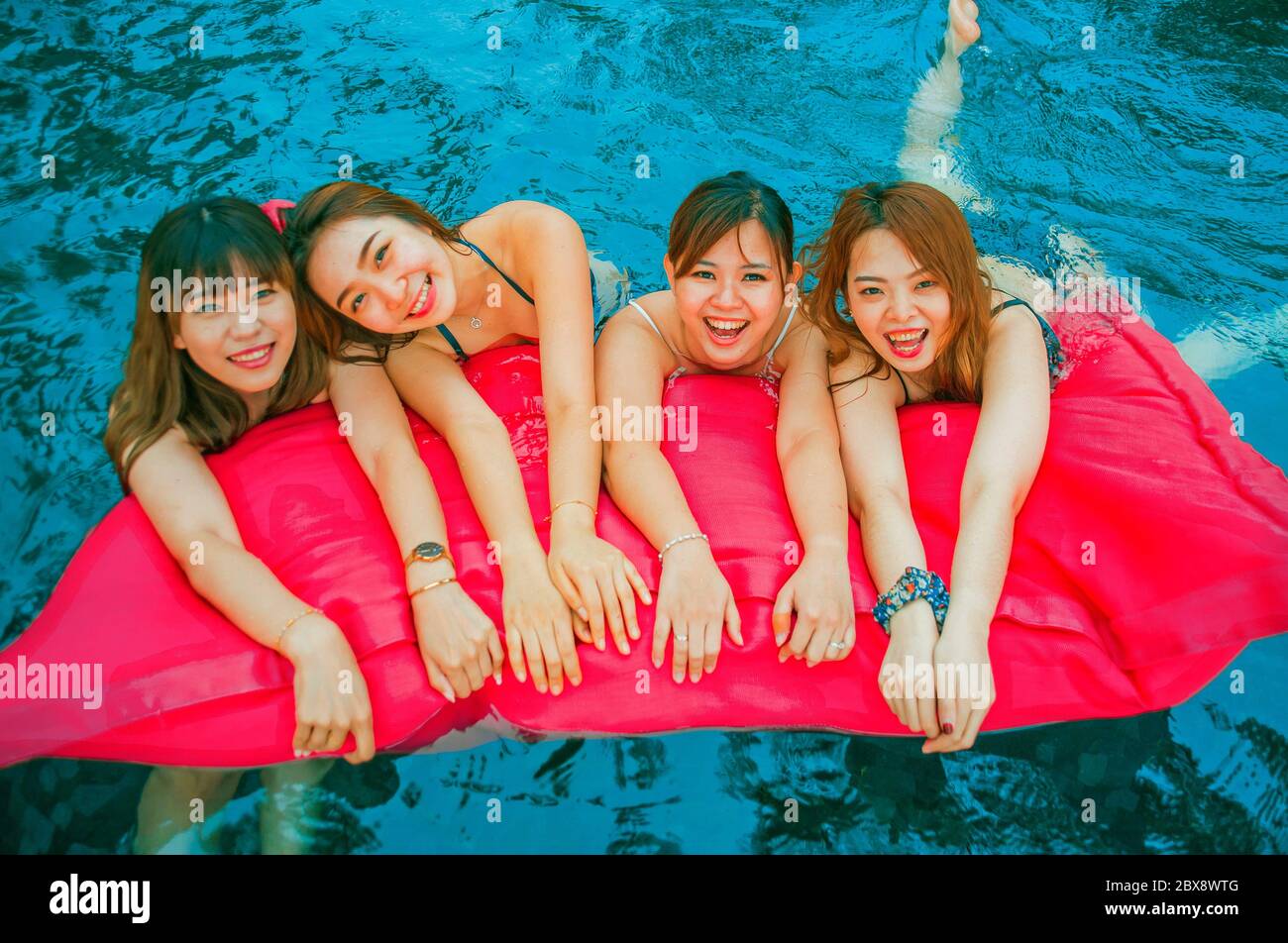 lifestyle portrait of young Asian Chinese and Korean women group of ...