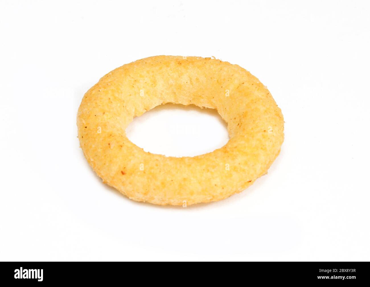A single crispy ring snack isolated on white background. Unhealthy Junk ...