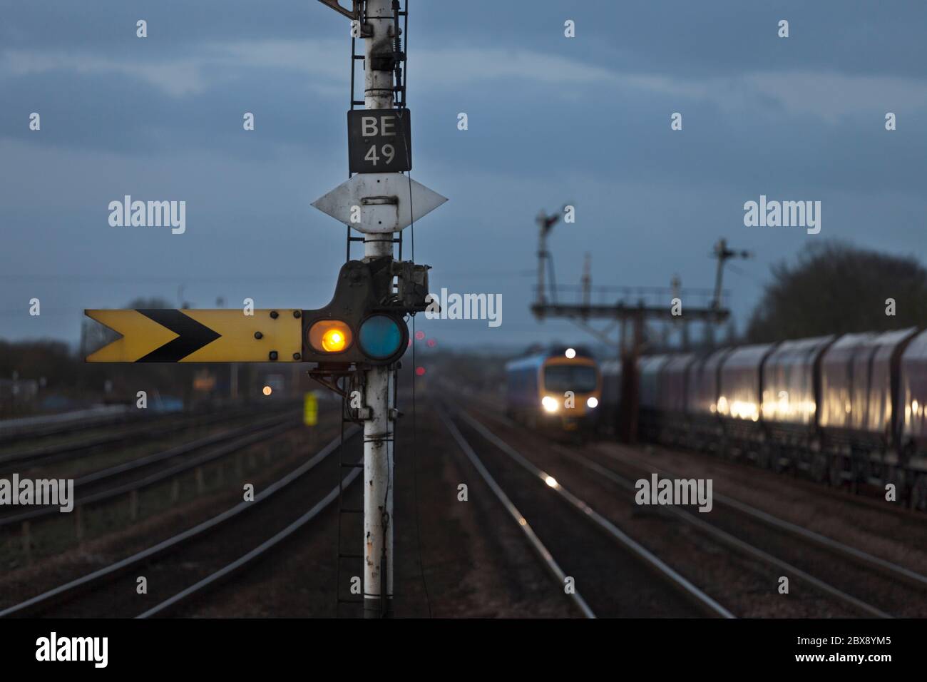 Semaphore distant railway signal with a approaching train at Barnetby ...
