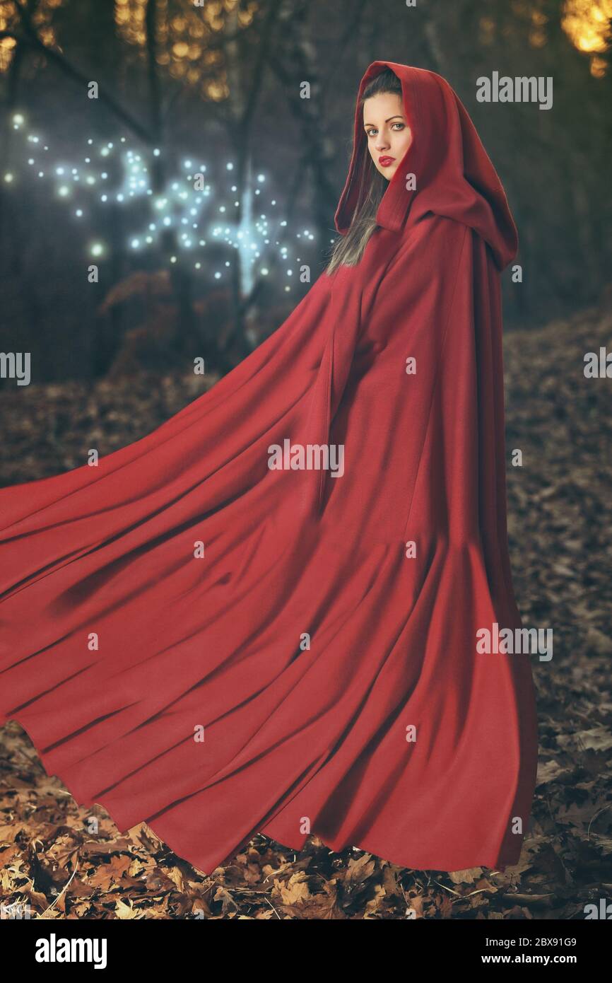 Mysterious woman in red cloak hi-res stock photography and images - Alamy