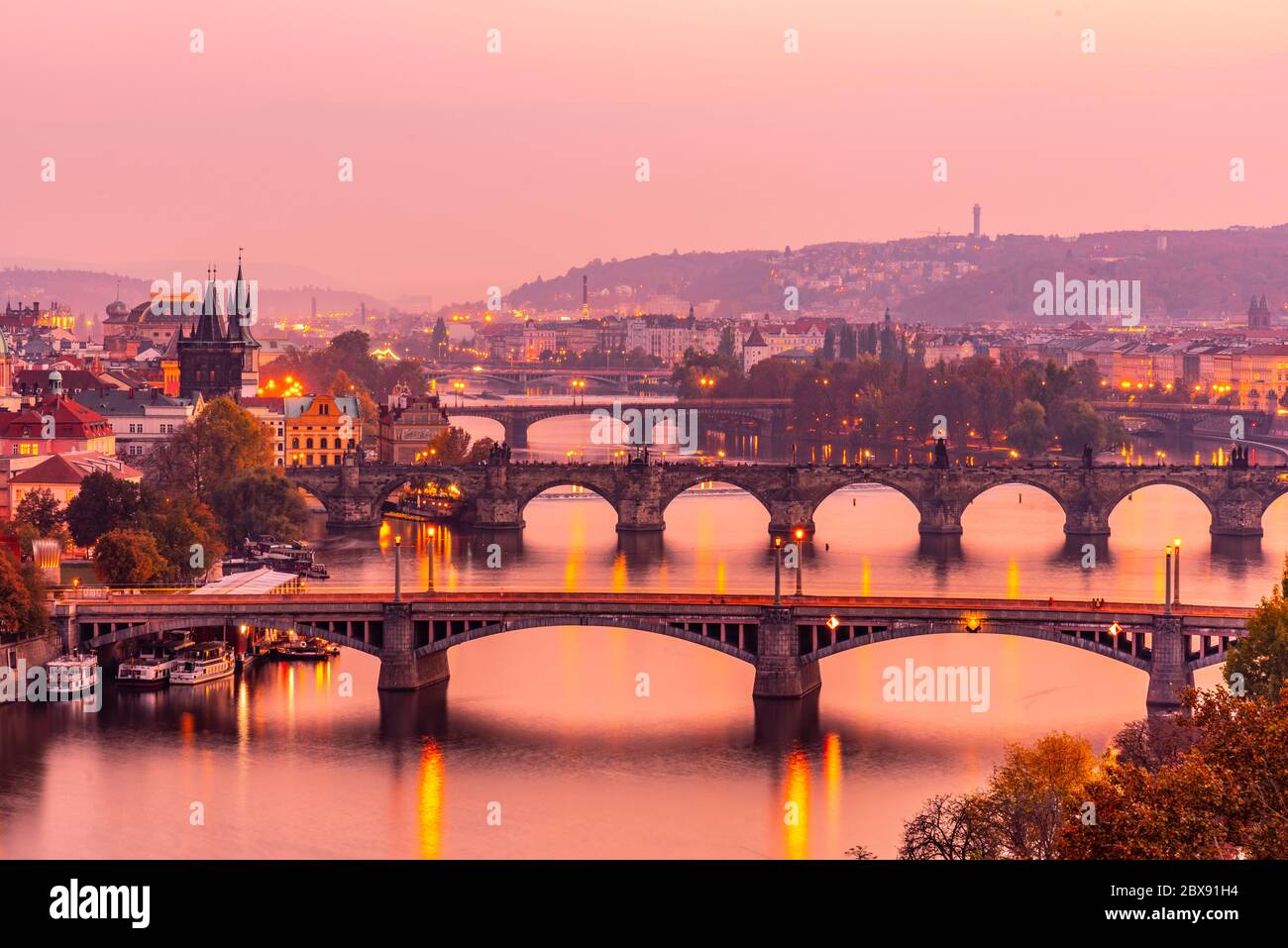 Prague bridges over Vltava River in the evening, Praha, Czech Republic ...