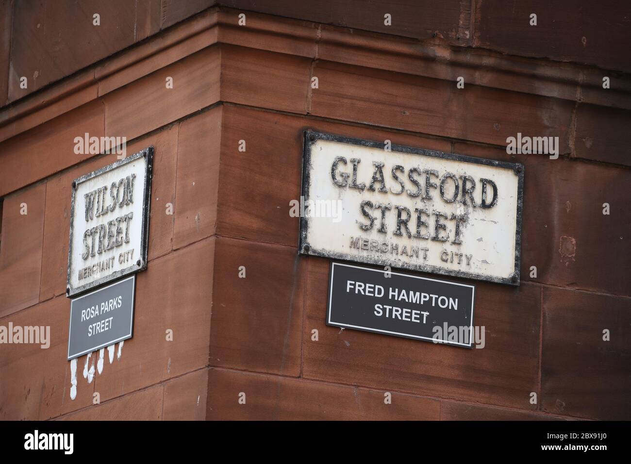 A sign alternatively naming Wilson Street 'Rosa Parks Street' and ...