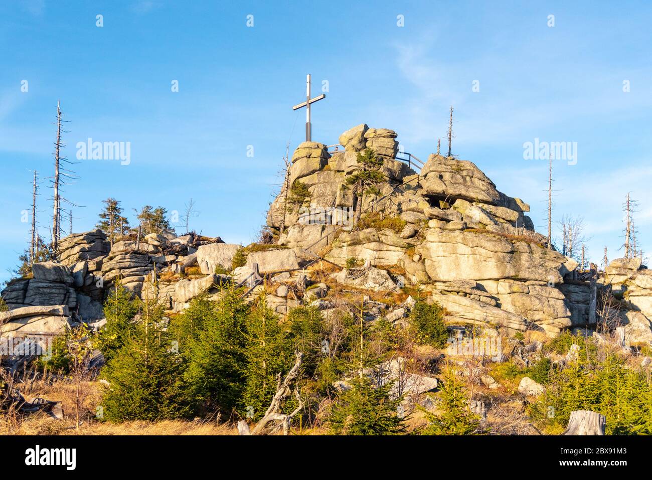 Granite rock formation with wooden cross on the top of Hochstein near ...