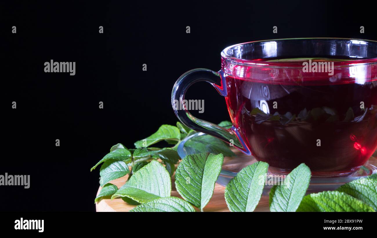 Tea time: cup of tea. Creative layout made of cup of hibiscus tea and ...