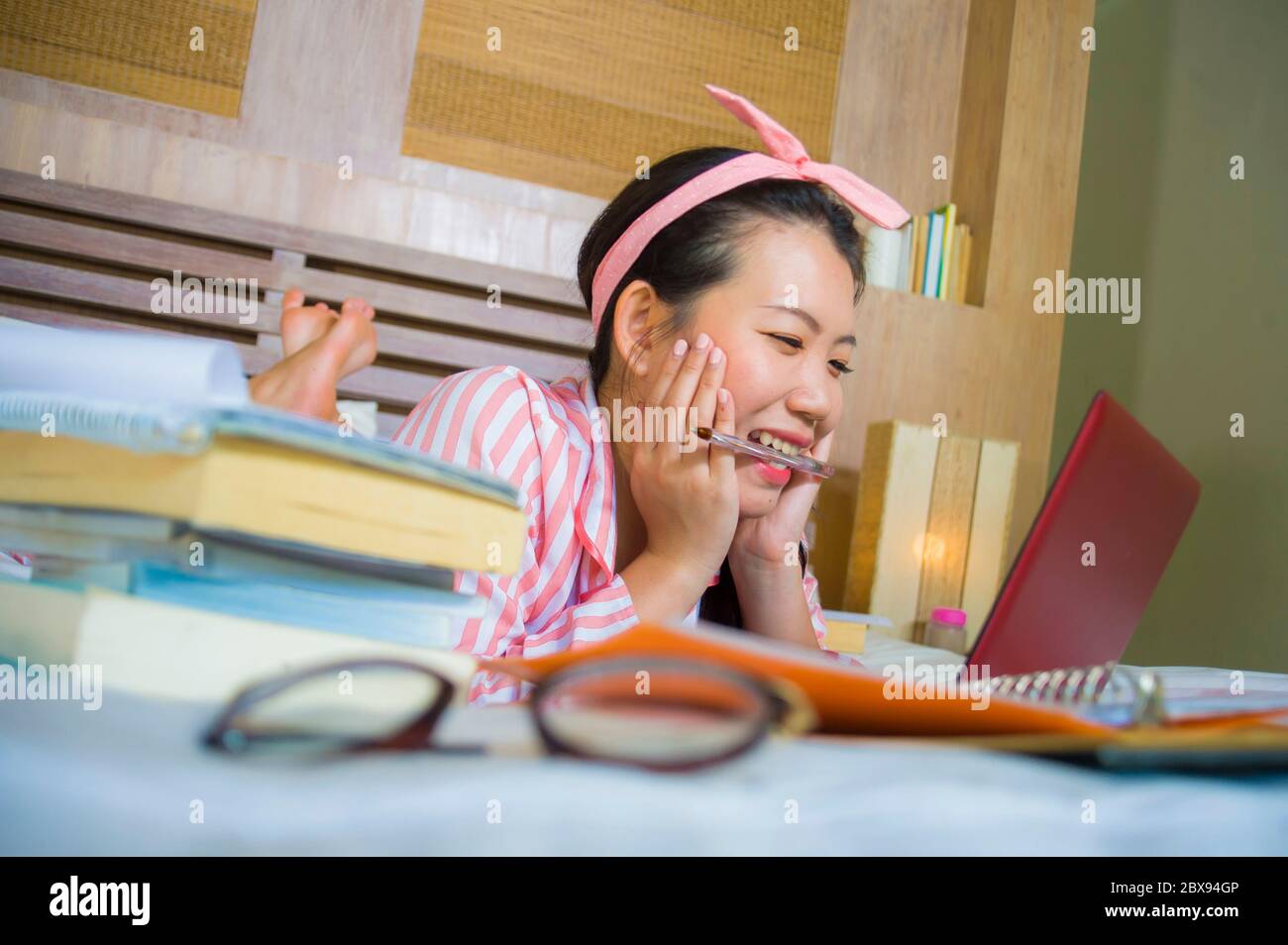 young cute and happy nerdy Asian Korean student teenager woman in nerd ...