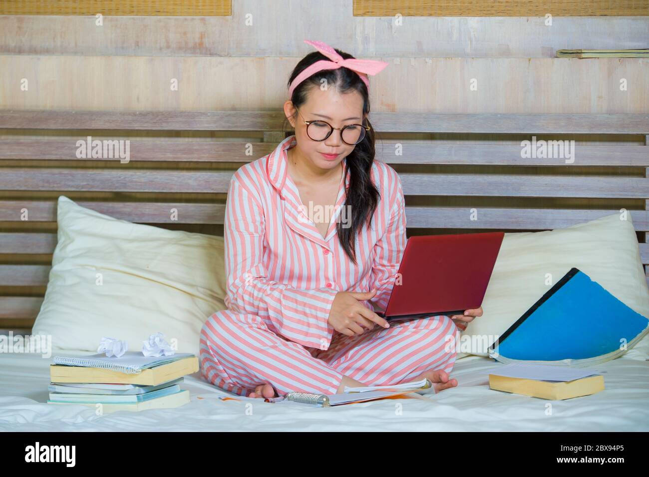 young confident and beautiful Asian Japanese student girl preparing ...