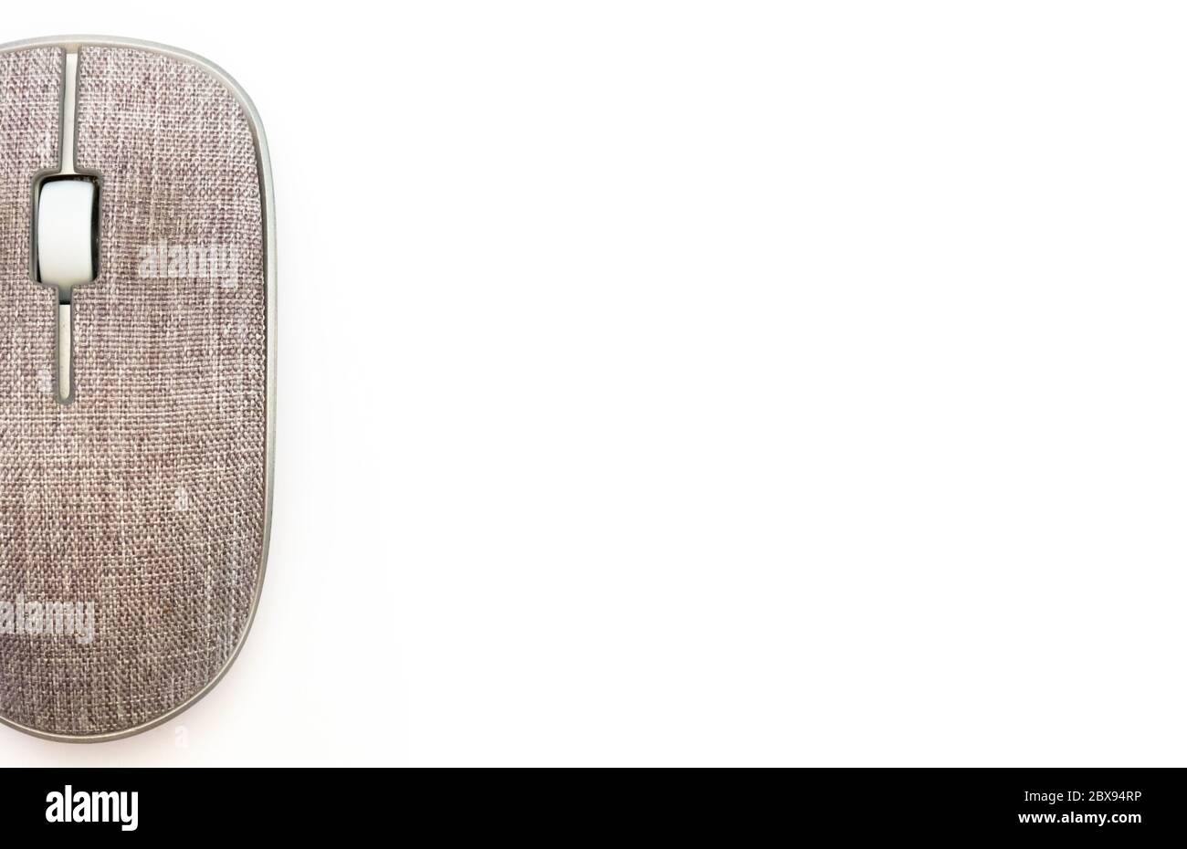 contemporary used material covered computer mouse in isolation on a ...