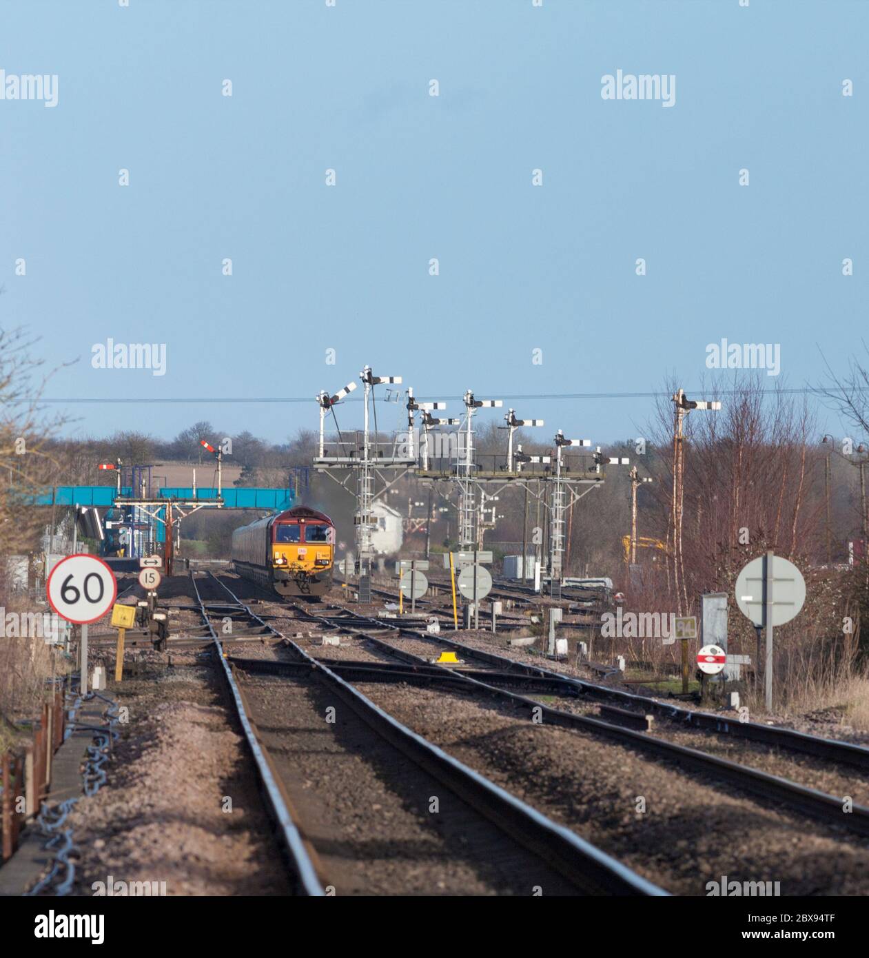 DB cargo class 66 locomotive 66137 passing the mechanical signal box at ...