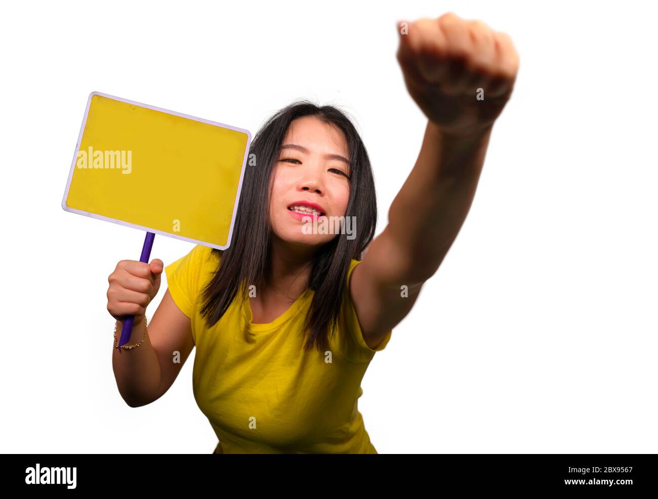 young beautiful and attractive Asian woman holding protest billboard ...