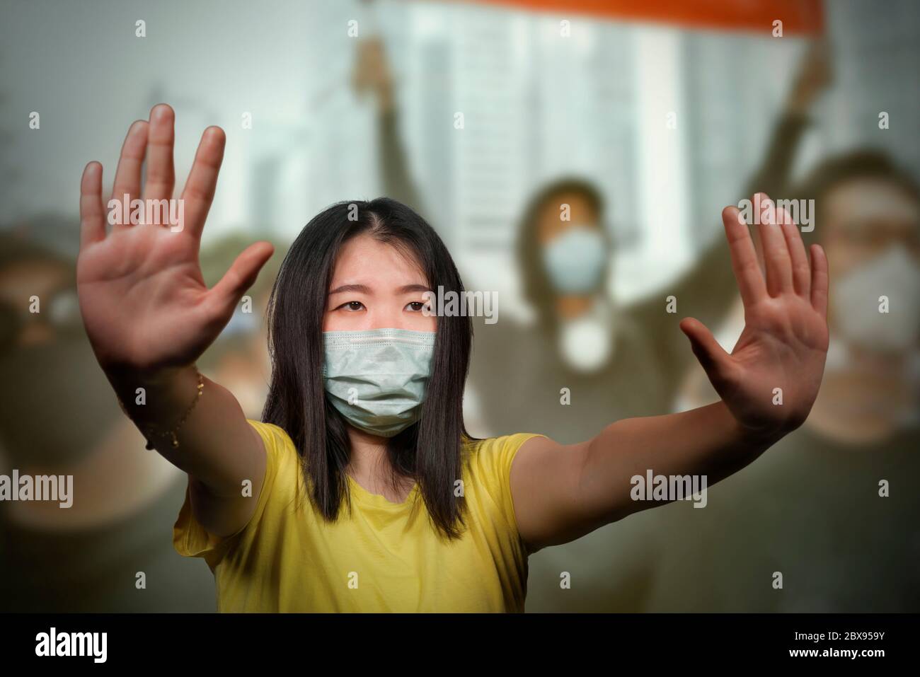young beautiful pacifist Asian woman angry and outraged protesting on ...