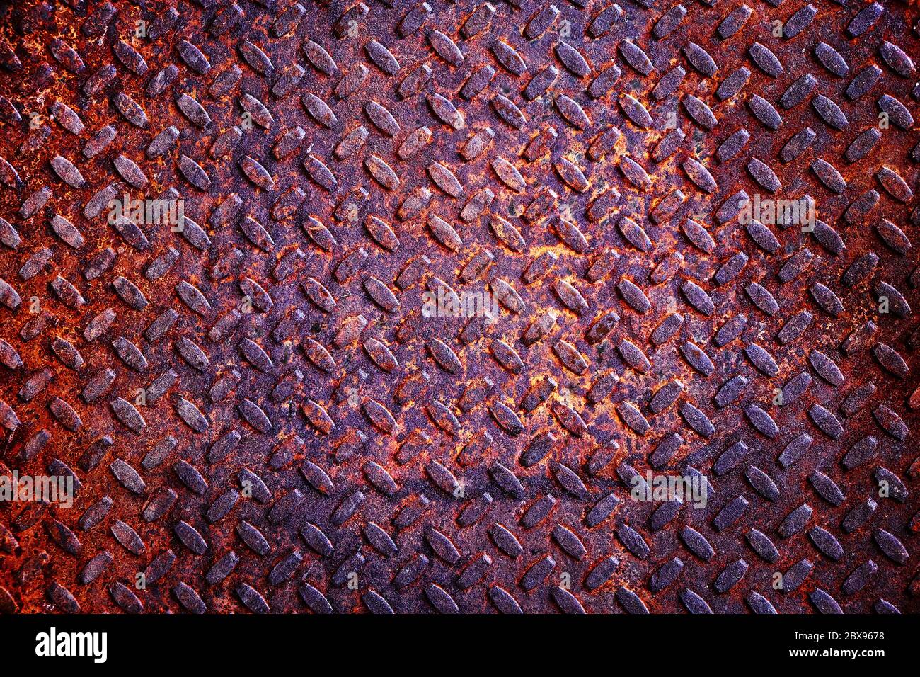 Old and rusty metal floor. Texture of a rough metal sheet with a convex ...
