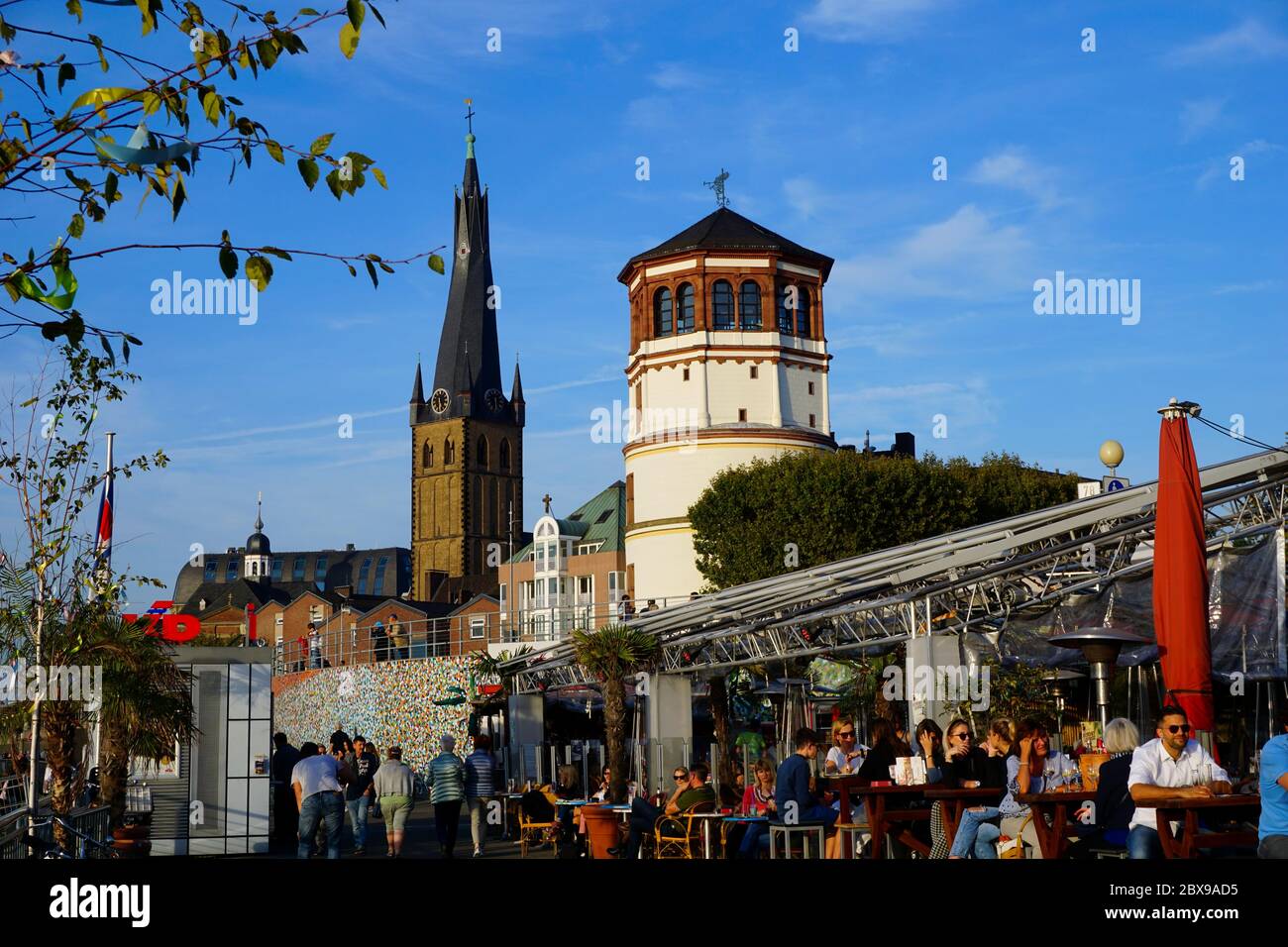 The popular tourist attraction Rhine river promenade with the two ...