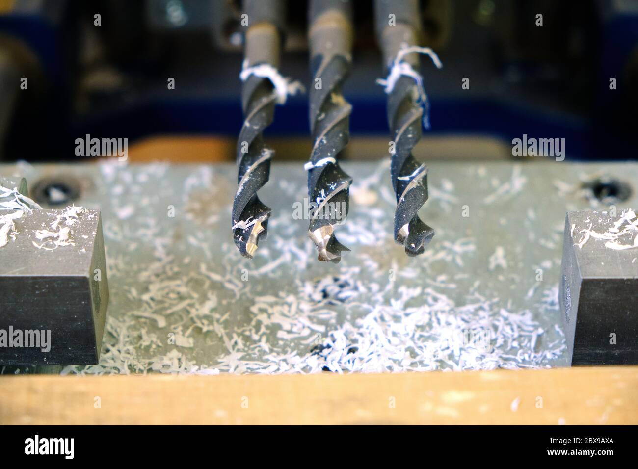 Three drill bit for cutting plastic profiles Stock Photo - Alamy