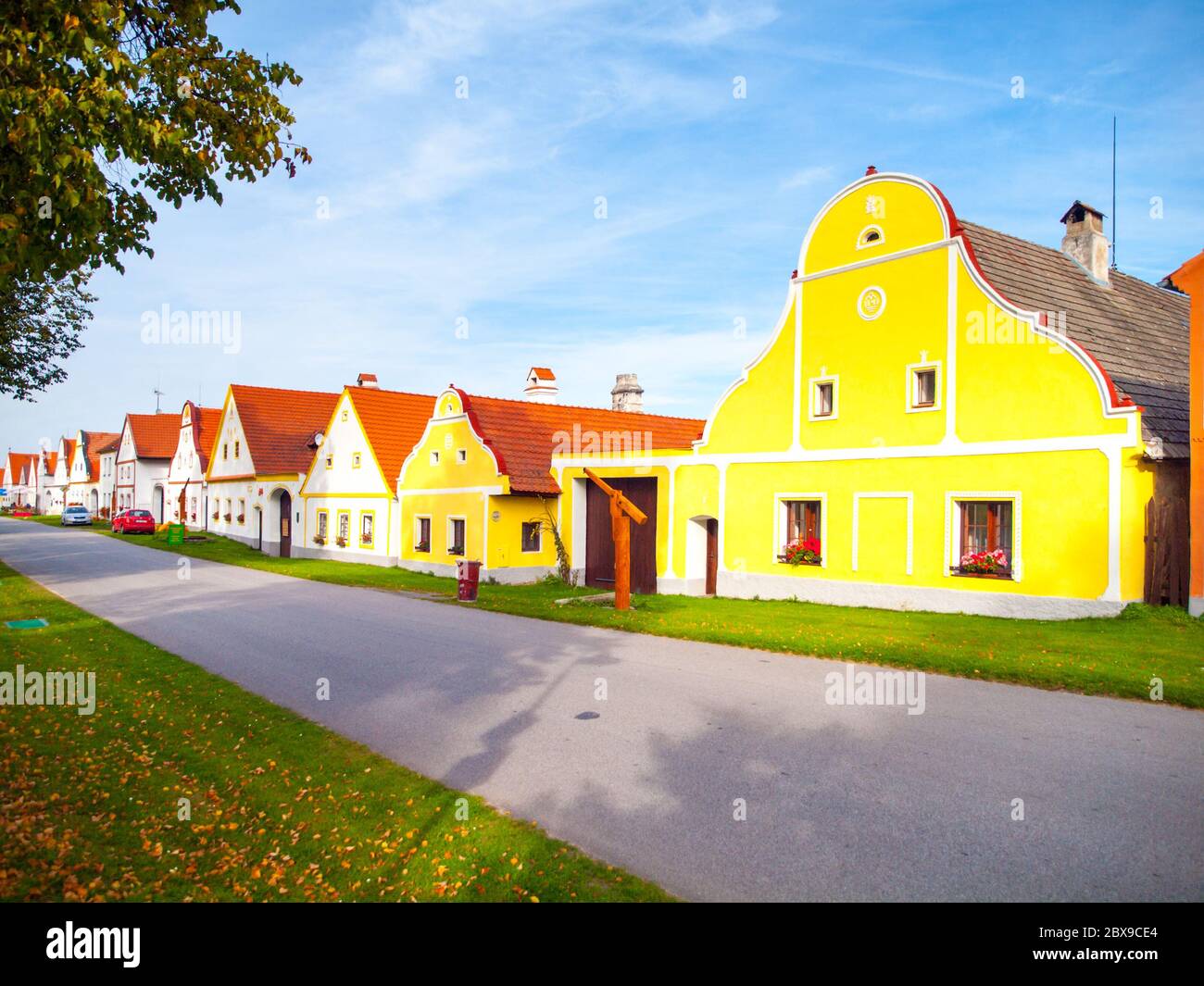 Picturesque houses of Holasovice, small rural village with rustic ...