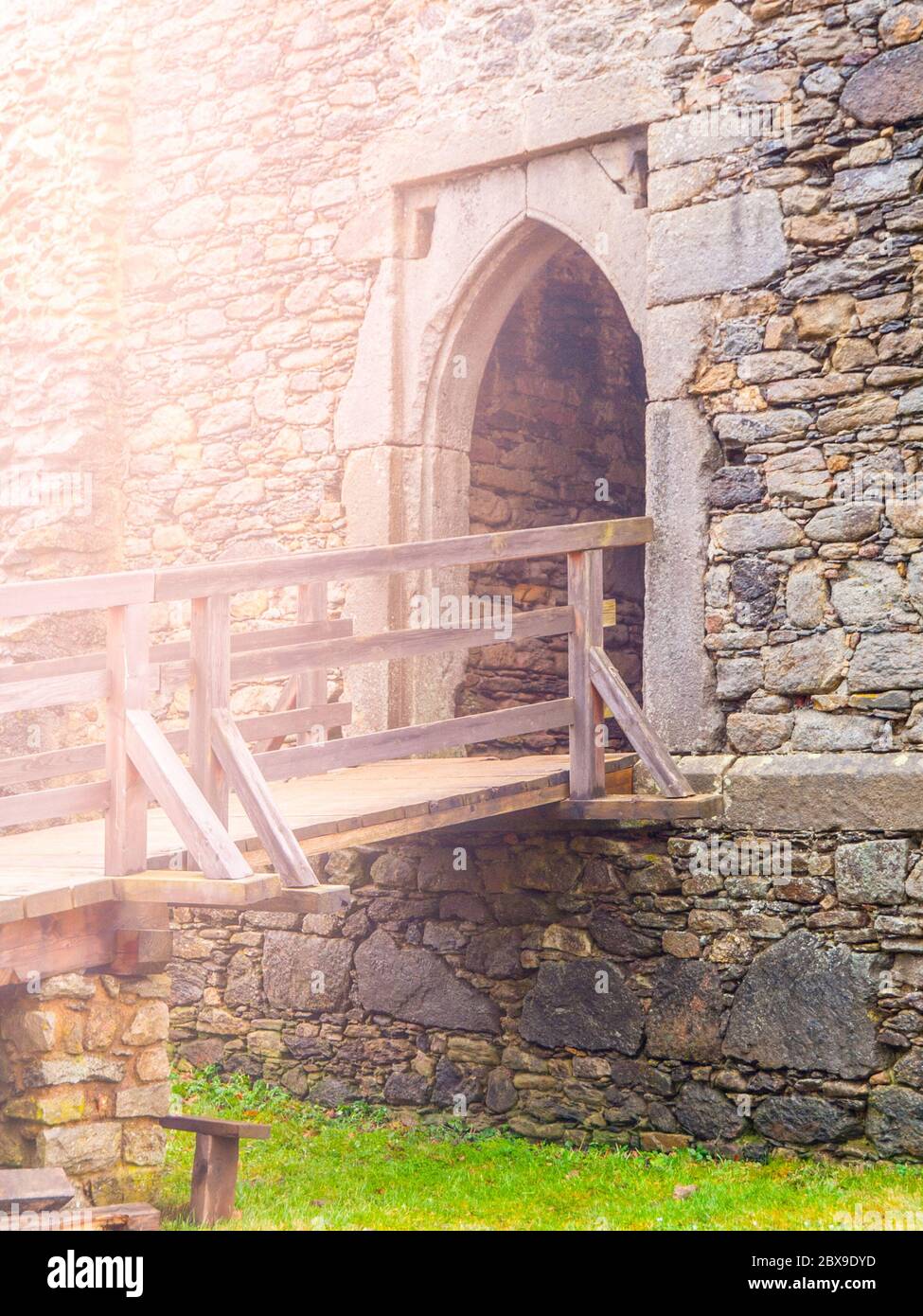 Old gothic arc gate in medieval stone castle ruin Stock Photo - Alamy