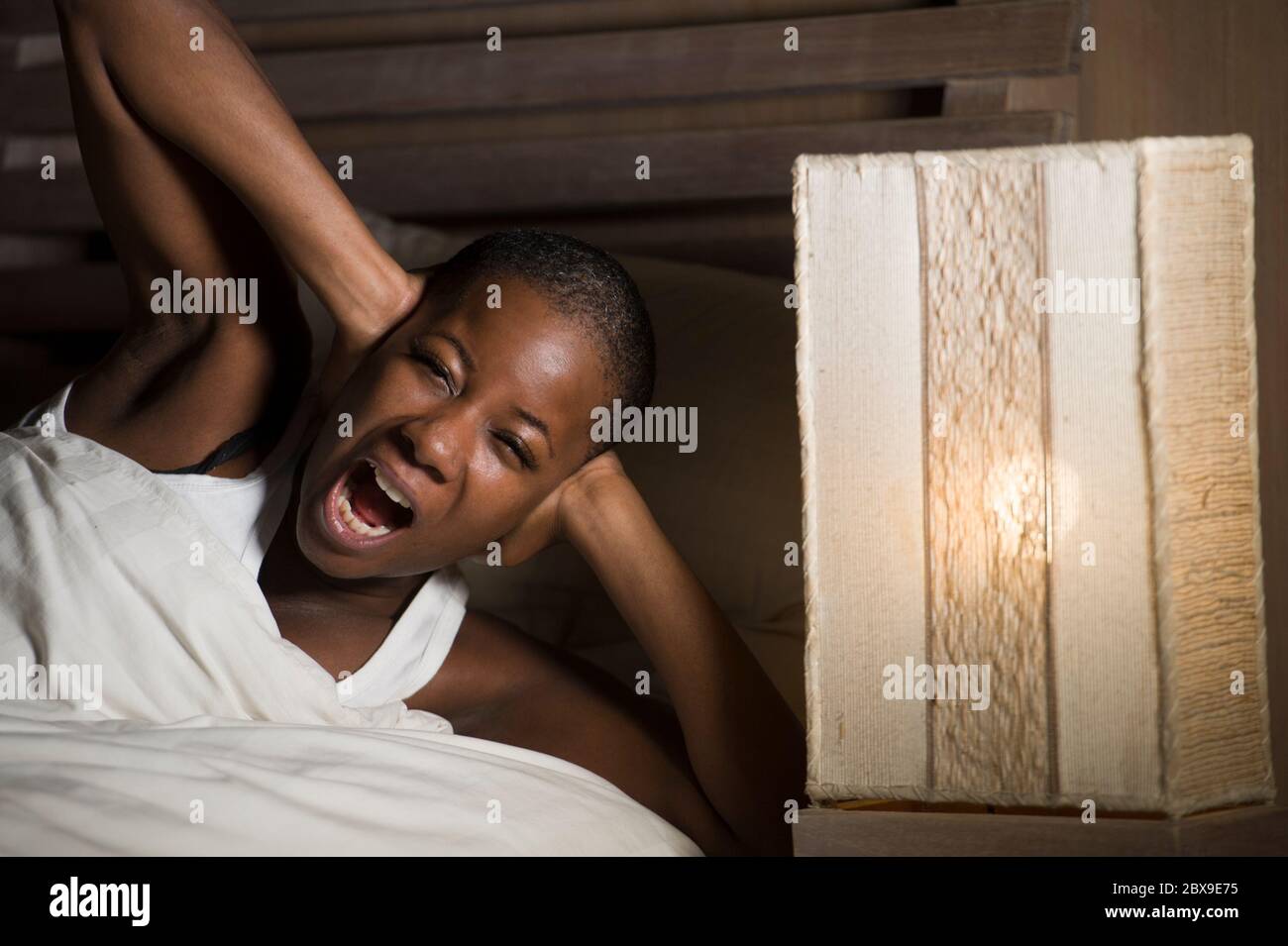 Girl screaming in bed hi-res stock photography and images - Alamy