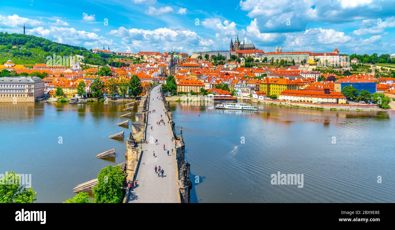 Prague panorama with Prague Castle, and Charles Bridge over Vltava River. View from Old Town ...