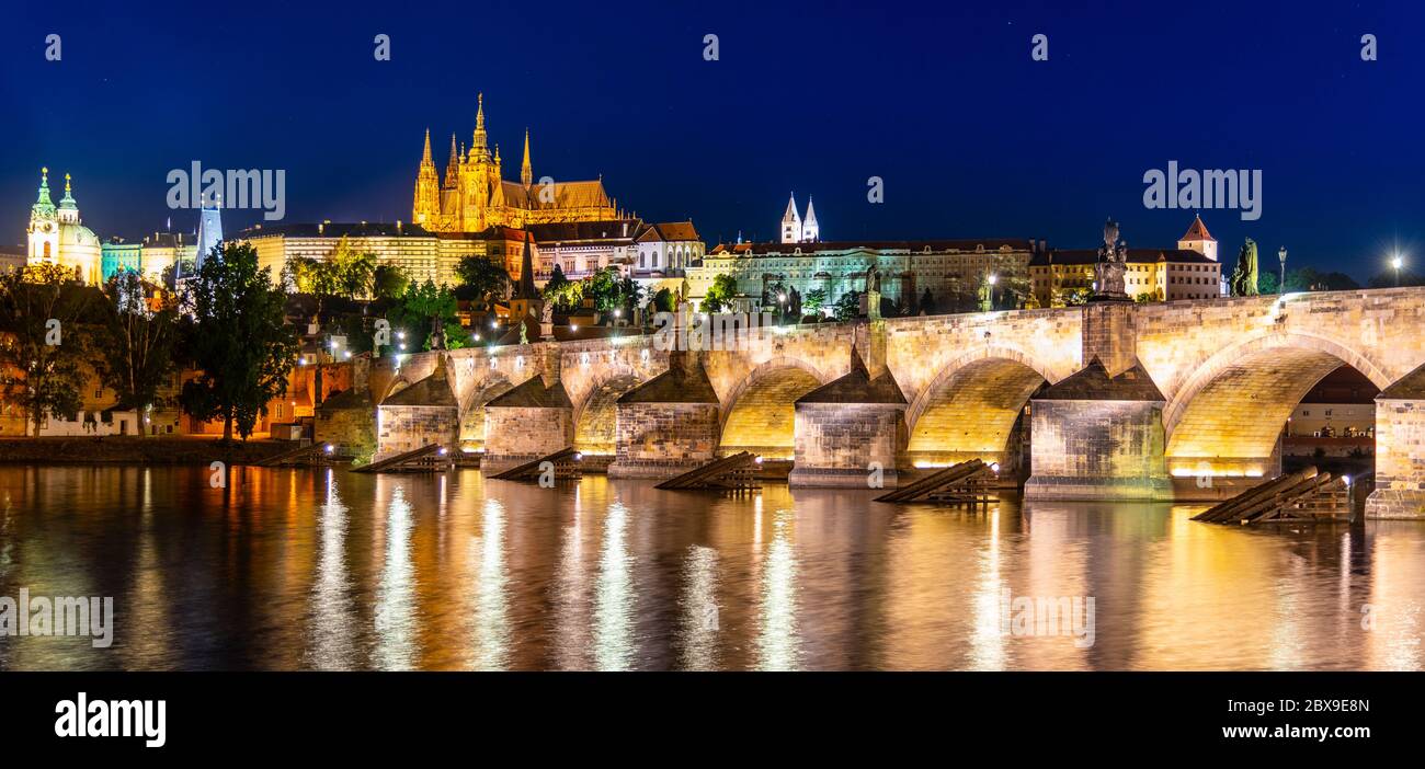 Prague night panorama. Prague Castle and Charles Bridge above Vltava River, Praha, Czech ...
