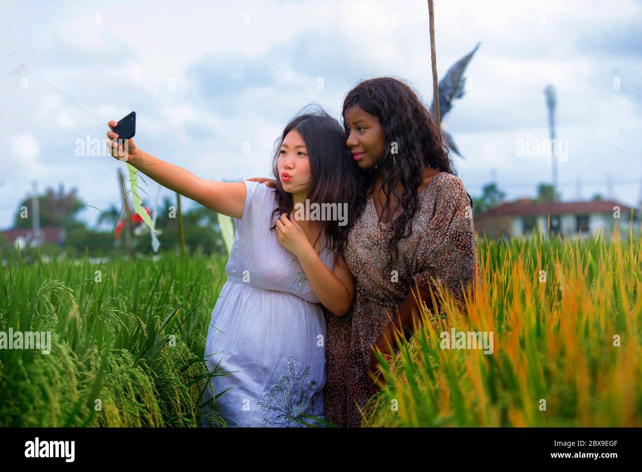 mixed ethnicity Asian Chinese girl and black African American woman ...