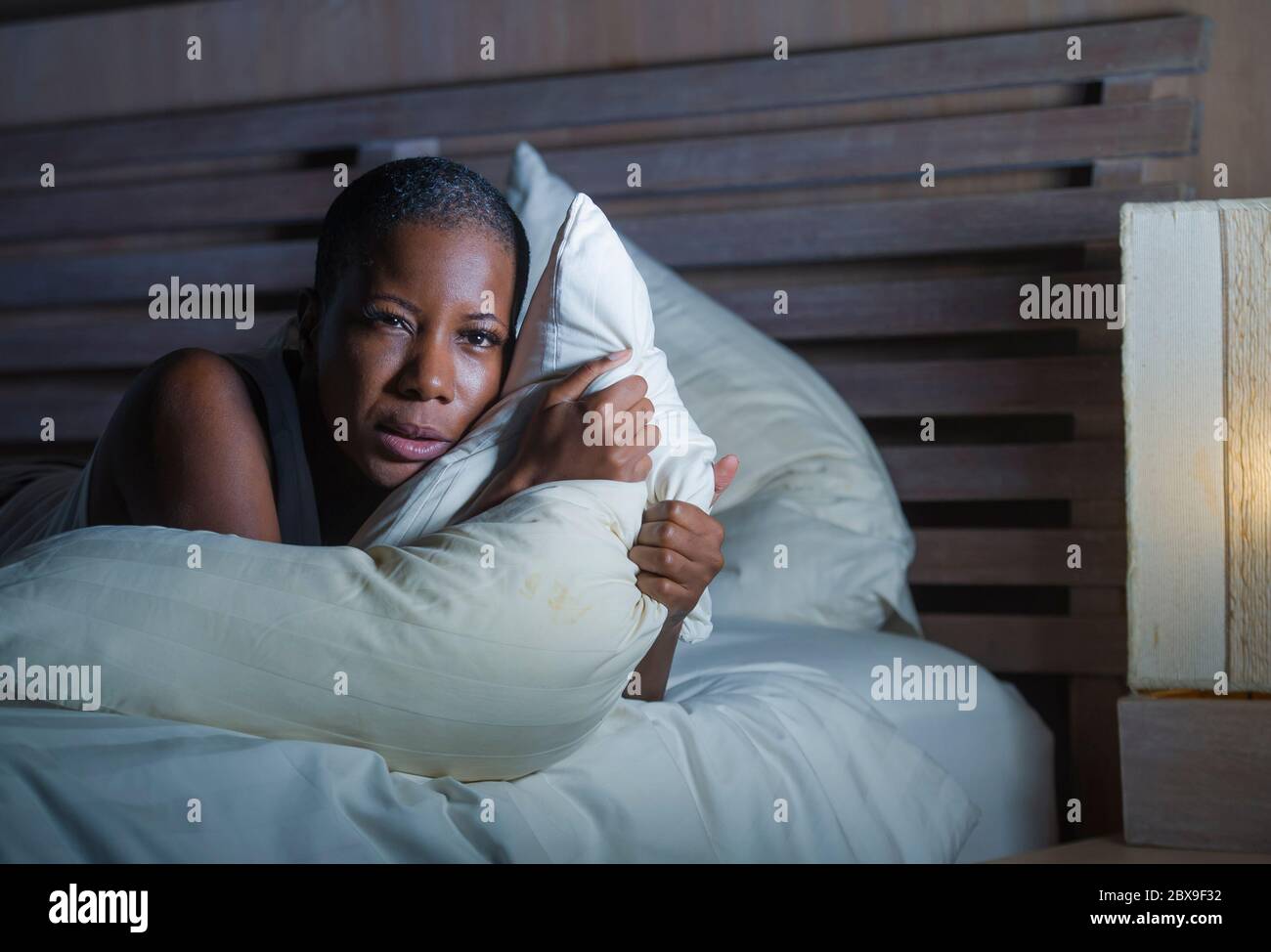 lifestyle night portrait of young scared and stressed black african ...