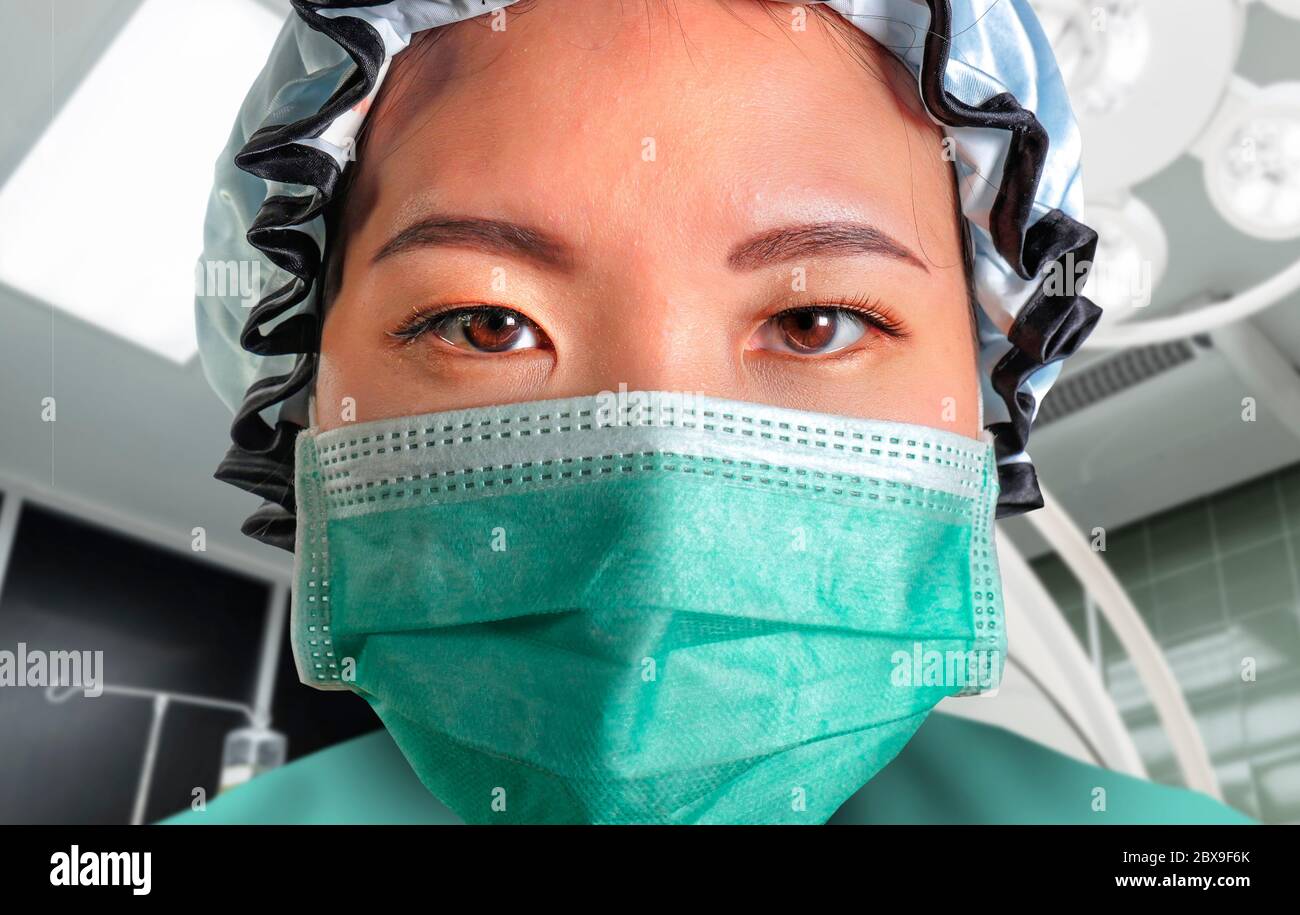 close up isolated portrait of young attractive and confident Asian ...