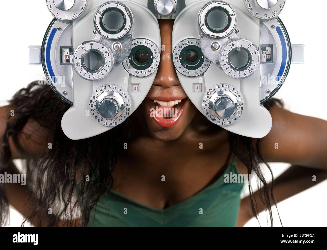 young and happy black afro American woman at hospital looking through ...