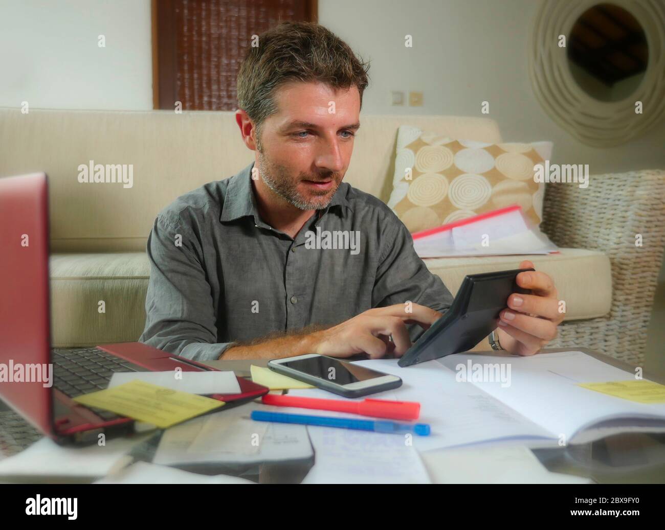 Man men male using calculator hi-res stock photography and images - Alamy