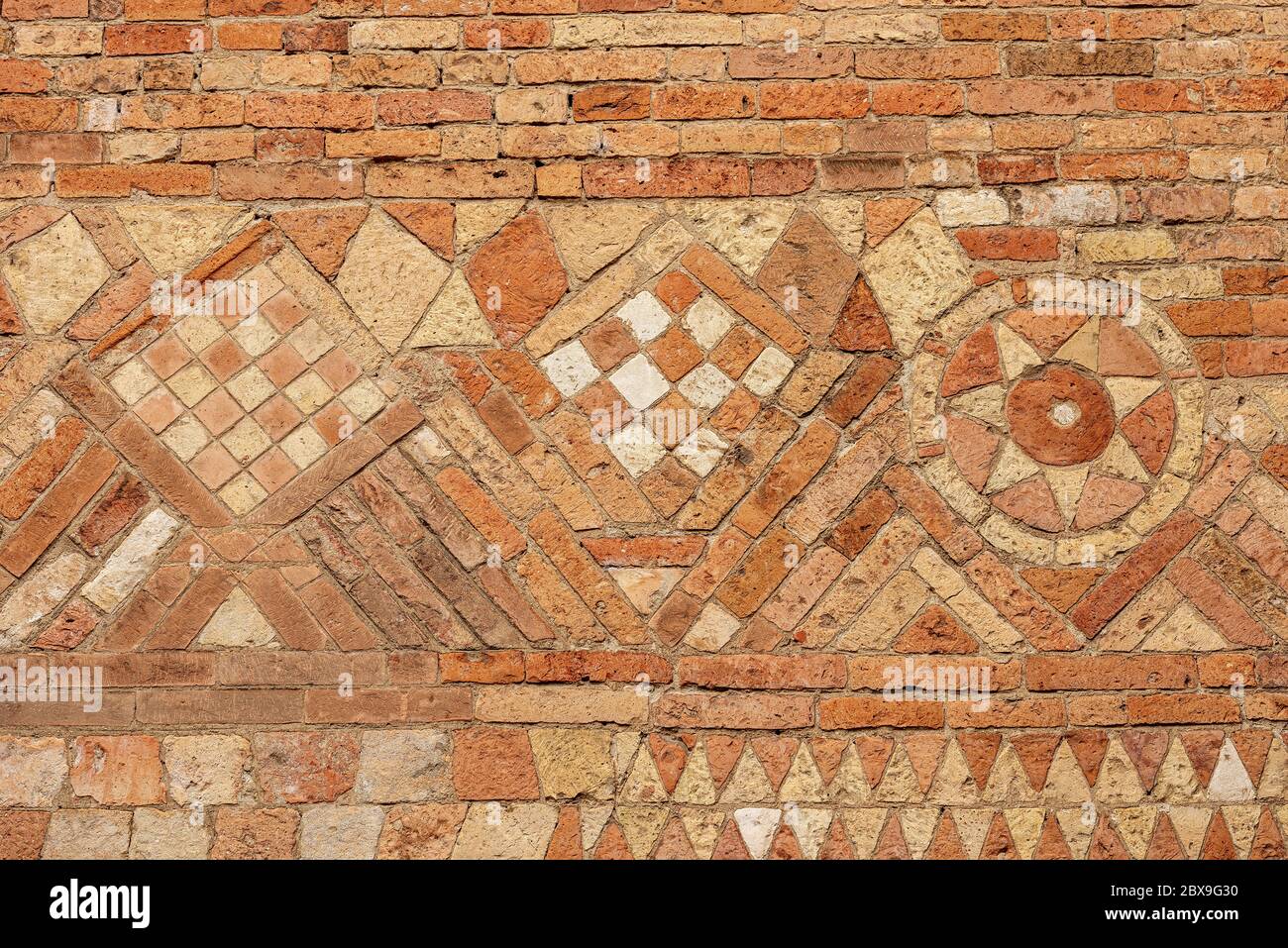 Ancient brick wall of the Basilica of Santo Stefano also called the ...