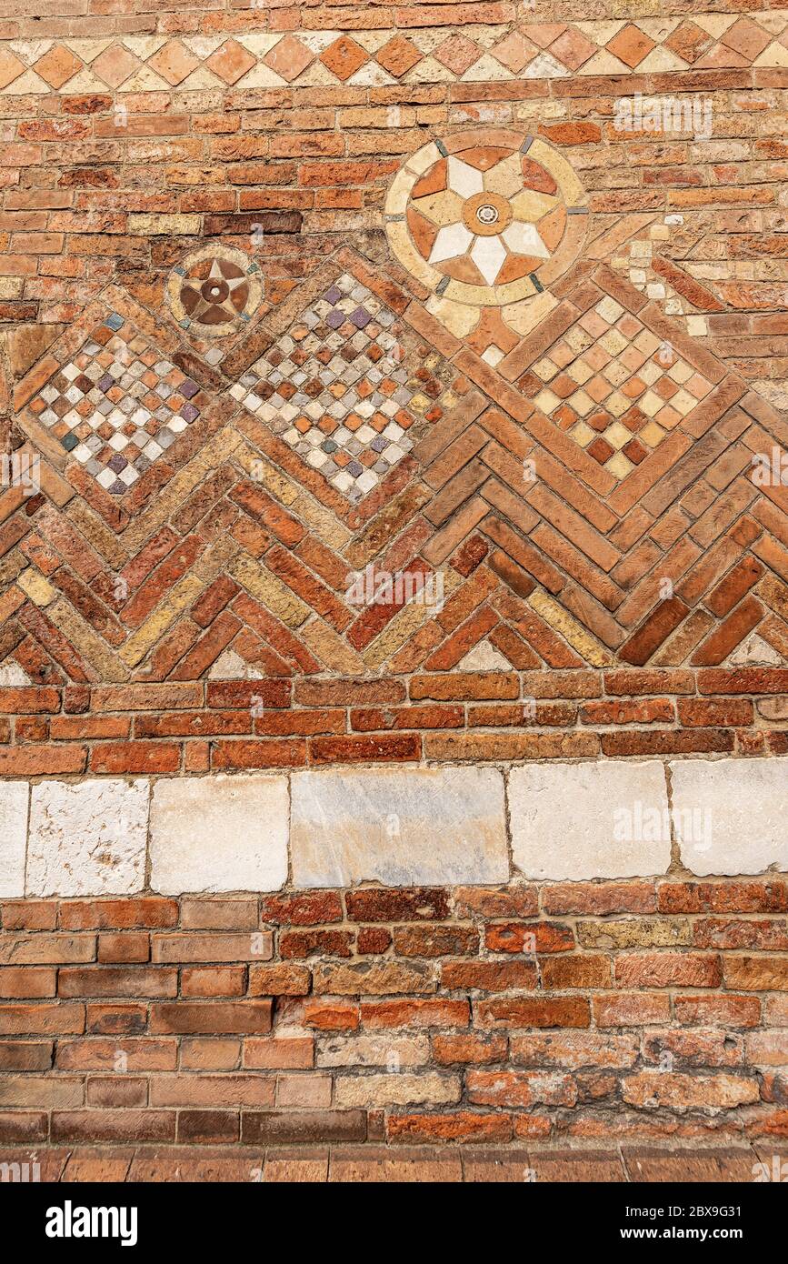 Ancient brick wall of the Basilica of Santo Stefano also called the ...